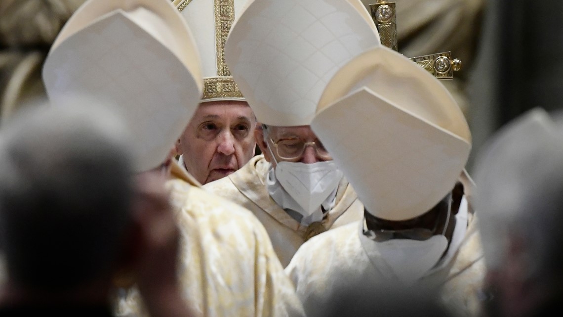 Hymns sung through masks, Christians mark pandemic Easter ...