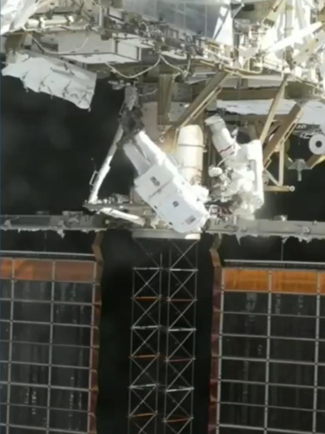NASA astronauts conduct spacewalk to upgrade ISS solar panels ...