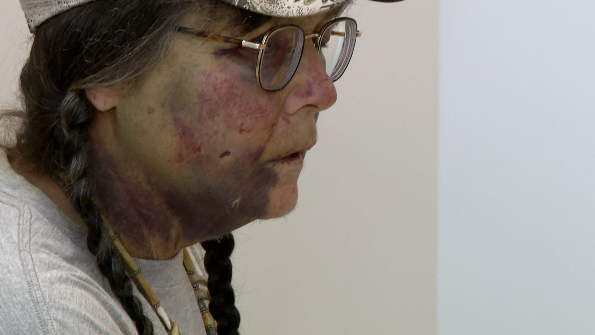 Woman suffers brutal attack during solo protest on Texas overpass ...