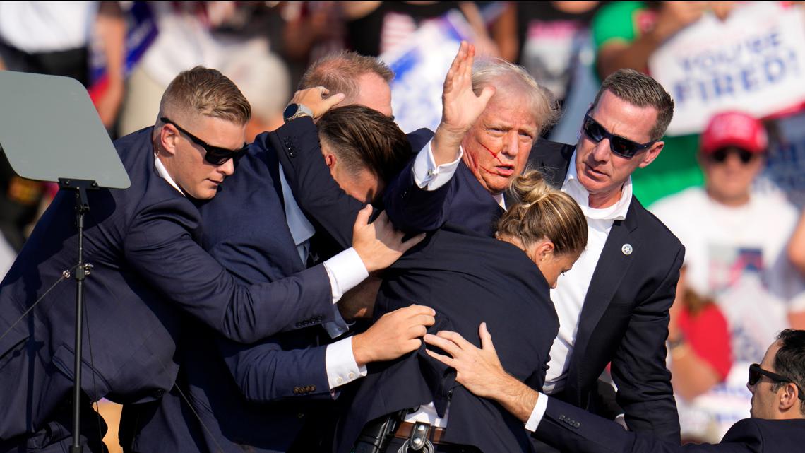 Donald Trump rally video shows chaos after gunshots ring out ...