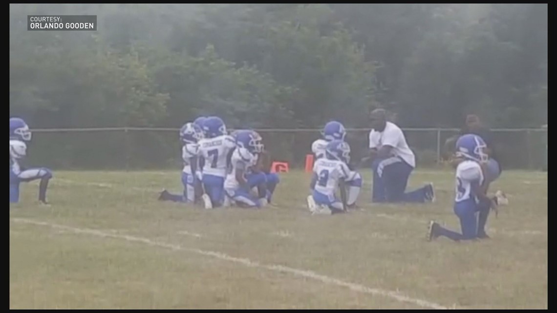 Youth football team kneels during national anthem | firstcoastnews.com