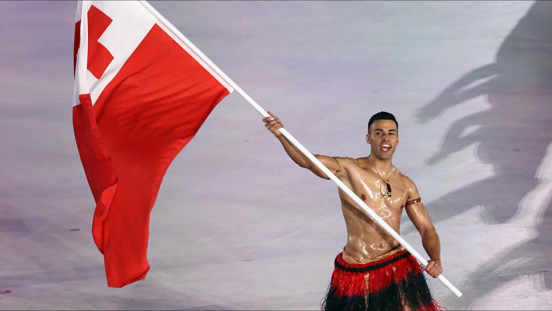 Tonga's flag bearer is shirtless again - and it's freezing at the ...