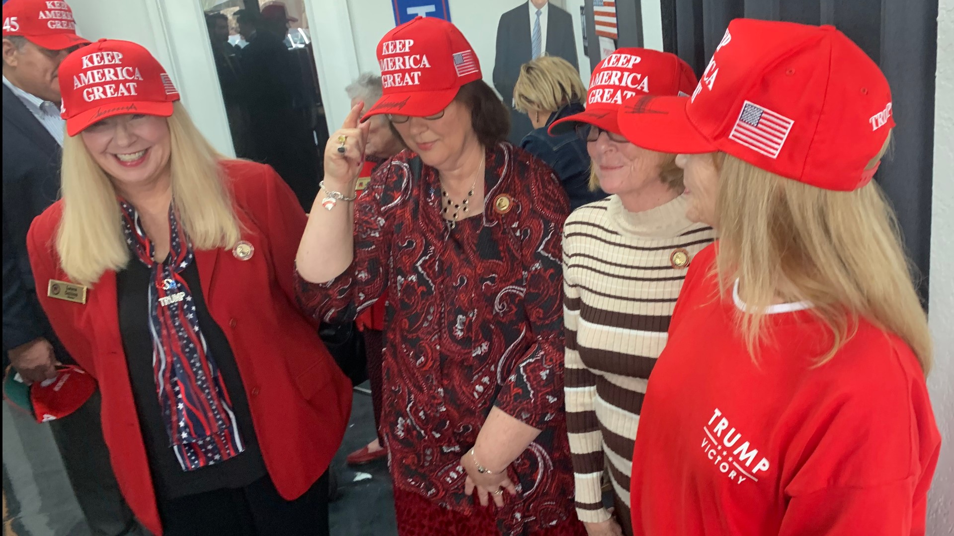 Trump signs hats for Republican volunteers attacked in Florida ...