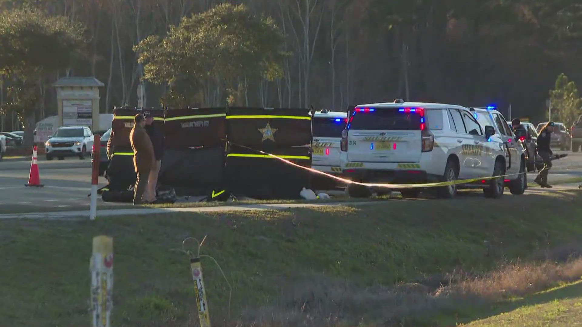 In-custody suspect dies after gun discharges in Nassau County, sheriff ...