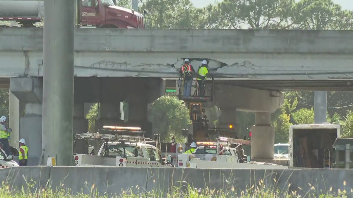 Over-extended truck dump bed hits I-95 overpass in Jacksonville ...