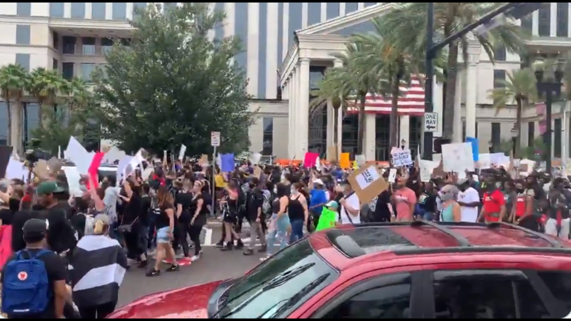 WATCH: Thousands protest, march in Downtown Jacksonville calling for ...