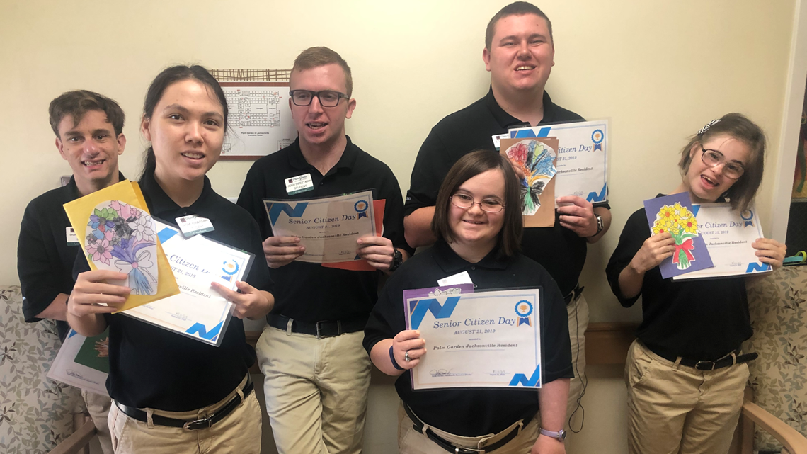 Interns give cards to residents for National Senior Citizen day ...