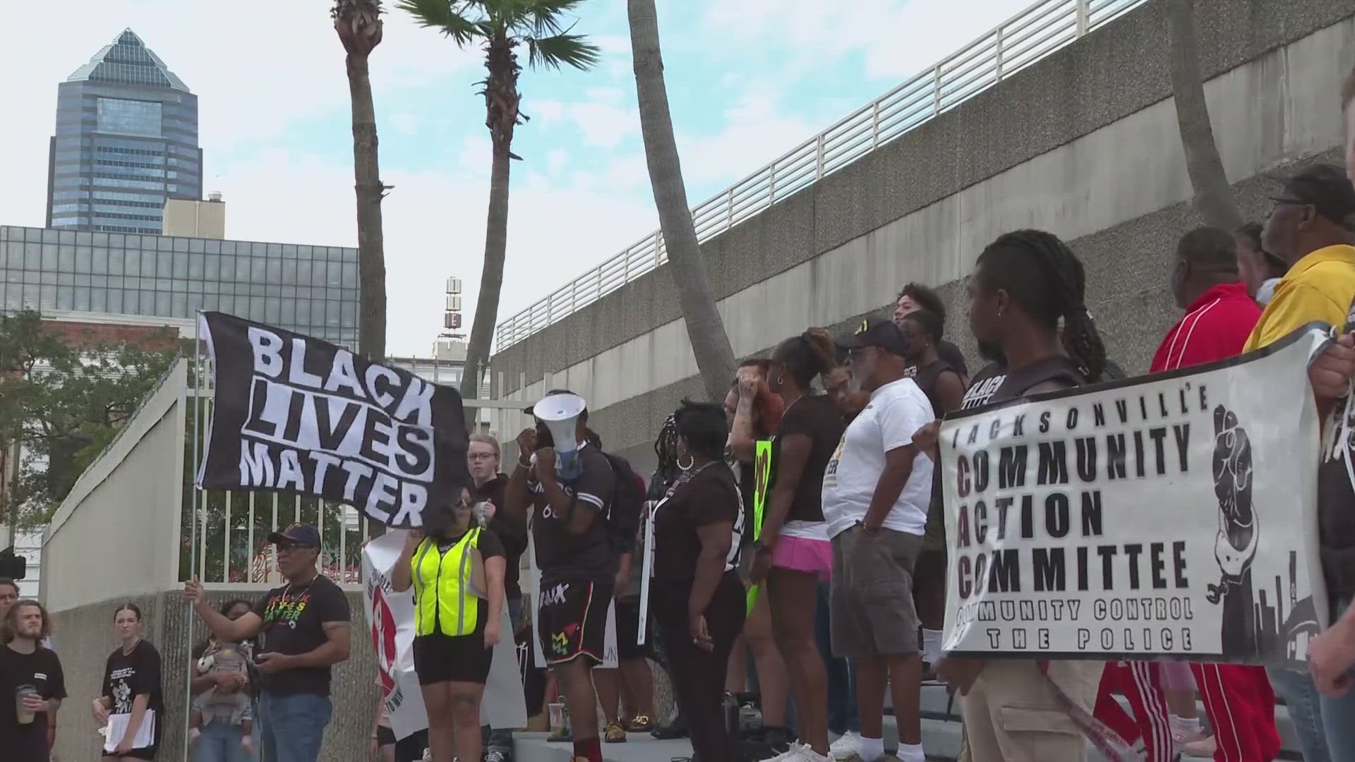 Protesters call for justice outside JSO headquarters after arrest video ...