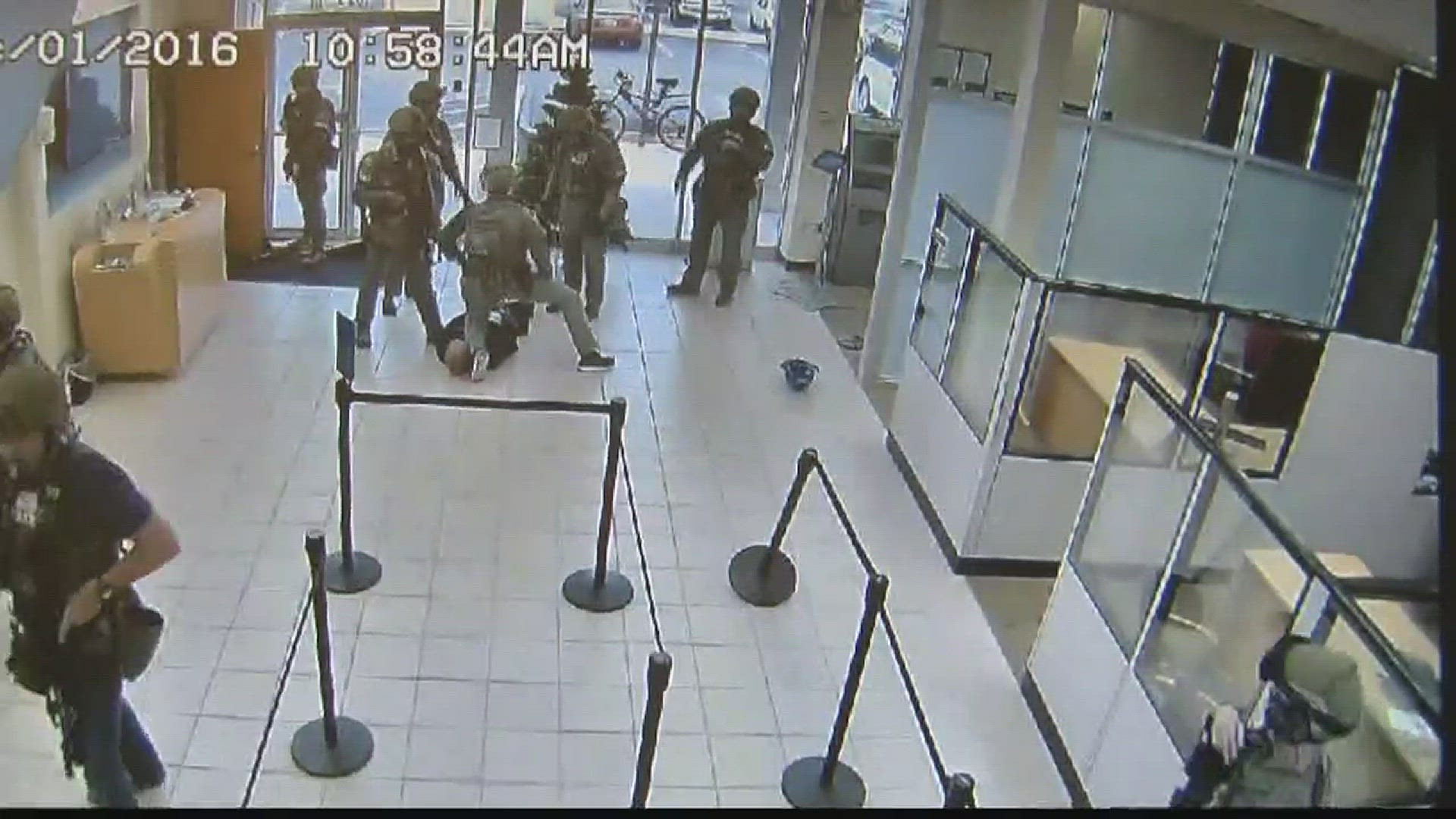 Surveillance video shows harrowing hostage situation at Jax credit ...