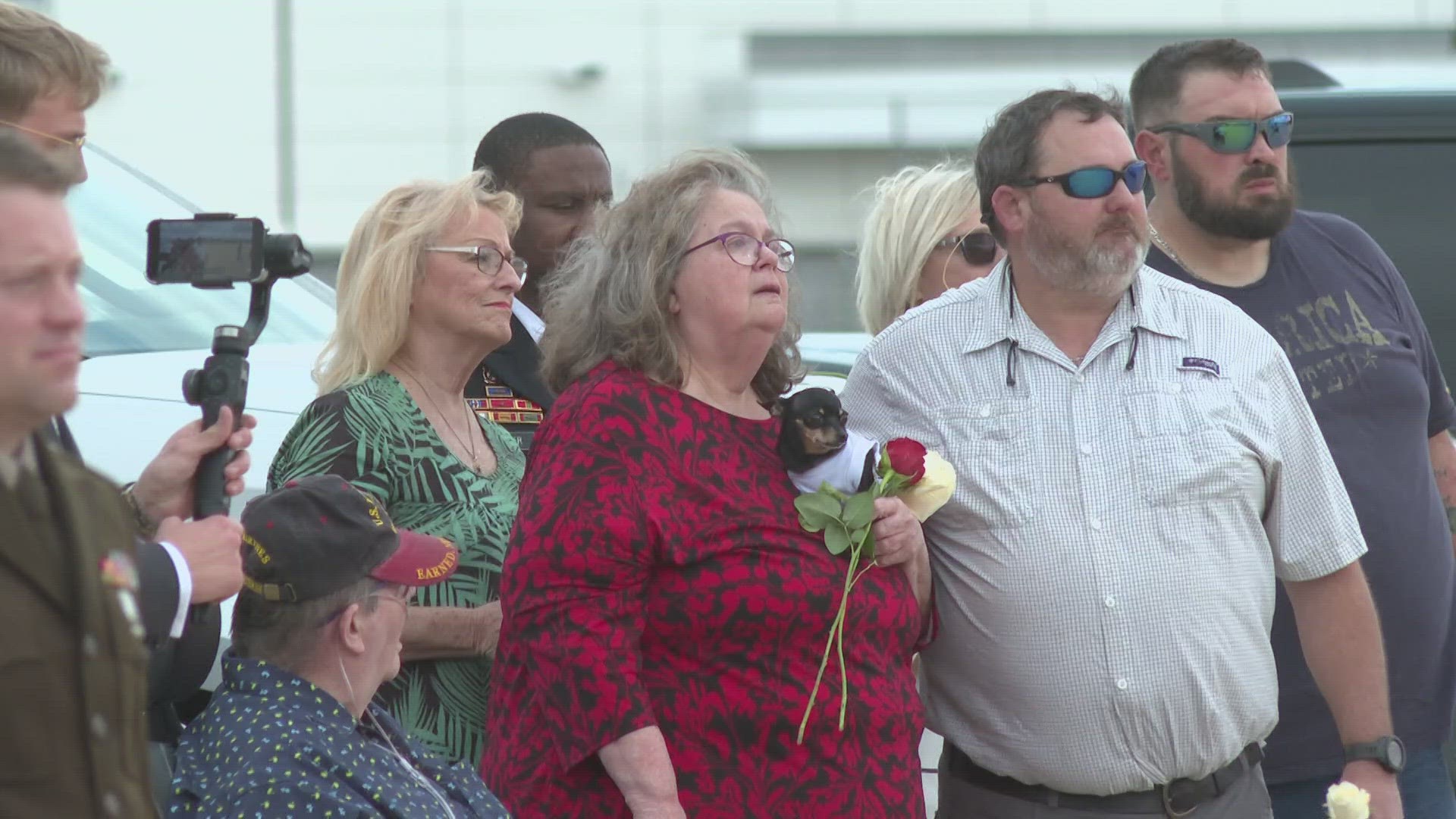 Daughter of fallen Korean War veteran receives father's remains in ...