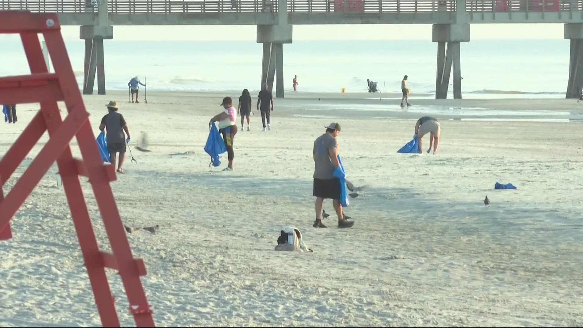 Volunteers hit Jacksonville Beach for annual cleanup after Fourth of ...