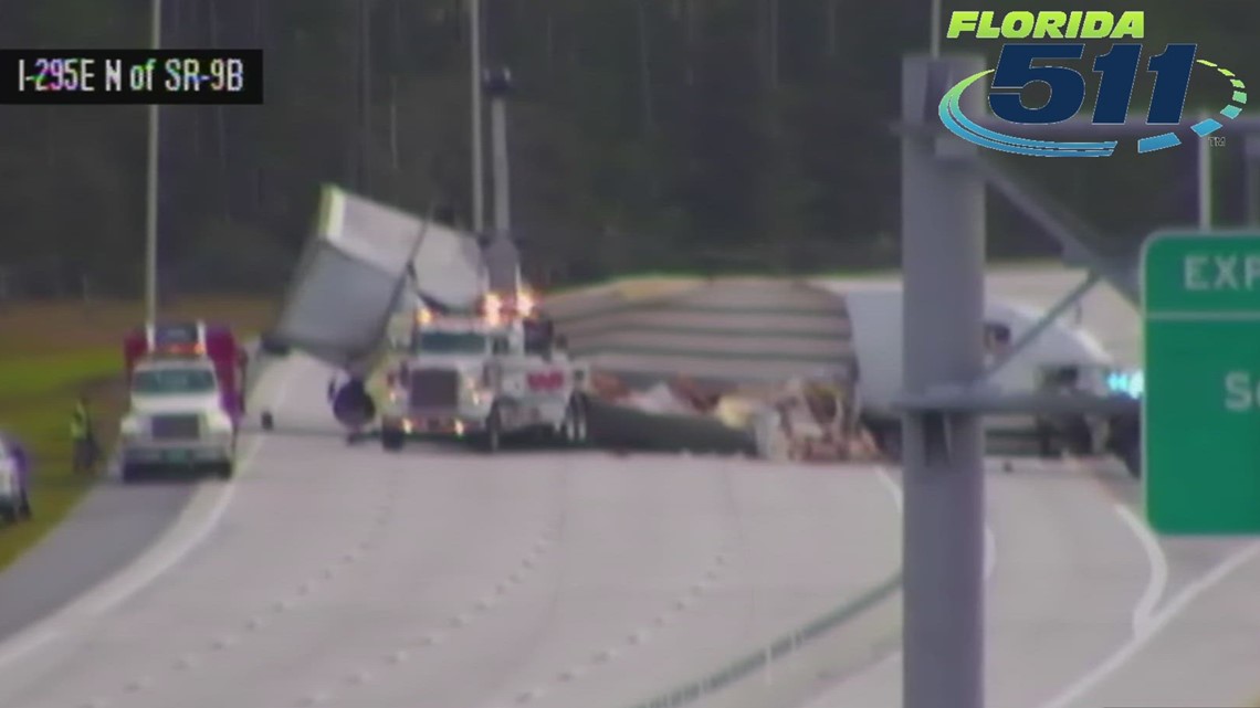 Emergency crews tear apart semitruck blocking all lanes of I-295 north ...