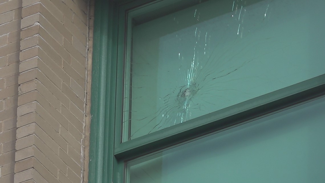 Bullet holes in windows at Jacksonville's City Hall | firstcoastnews.com