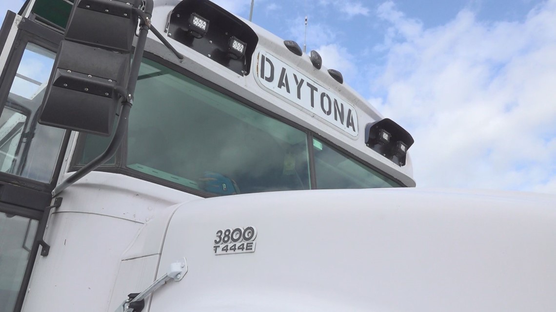 NASCAR fan's old school bus turning heads in RV City | firstcoastnews.com