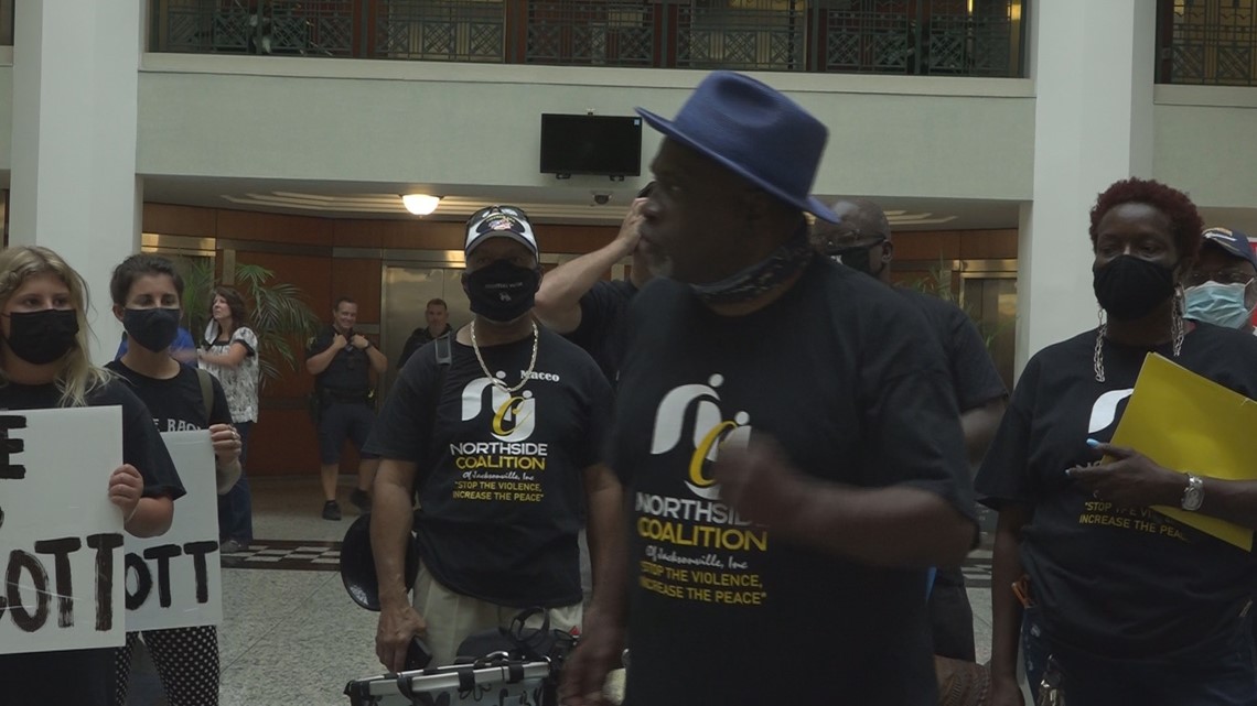 Protest held at urging Jacksonville mayor to remove staues ...