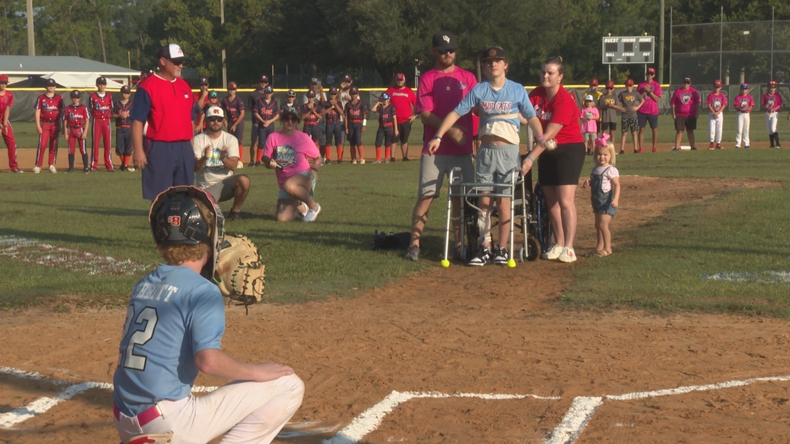 Baker County boy injured in swimming accident throws first pitch at ...