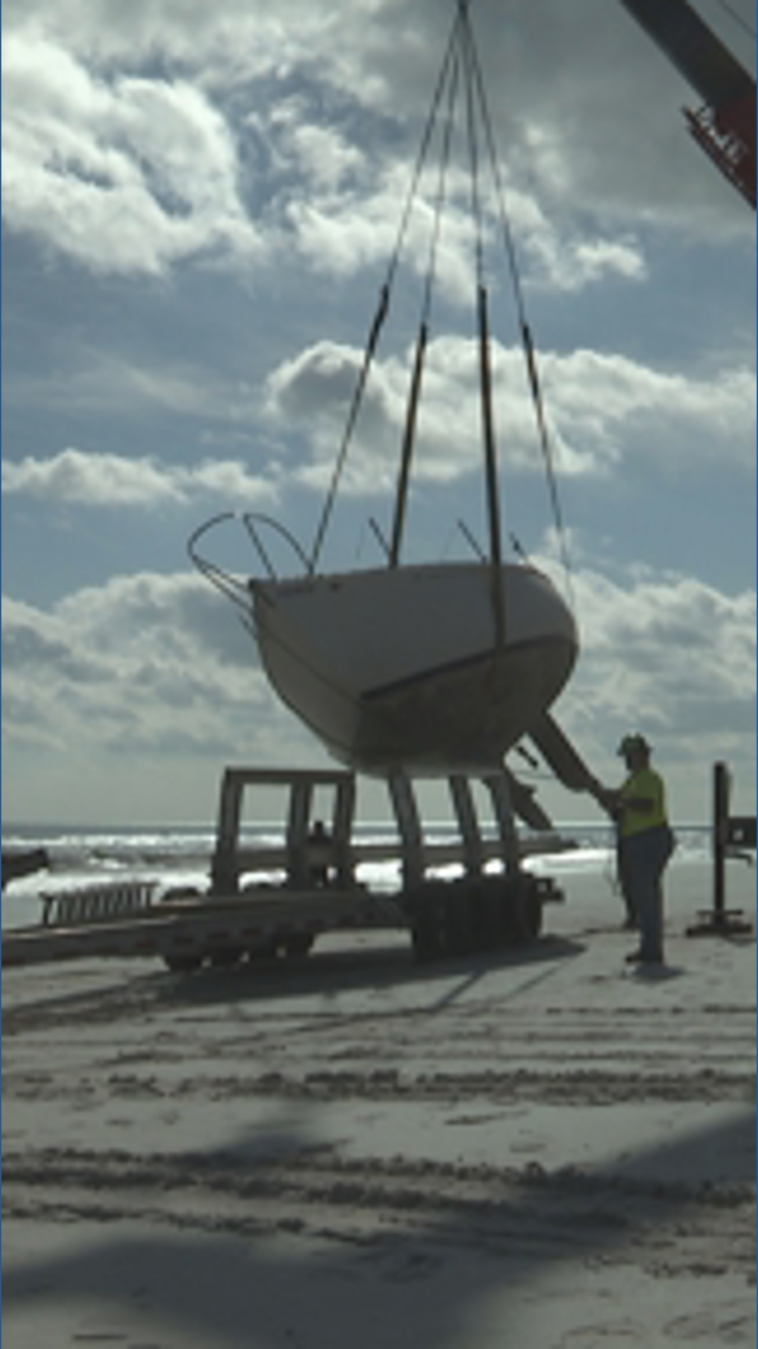 'We knew it was going to work': Beached sailboat gets towed out of ...